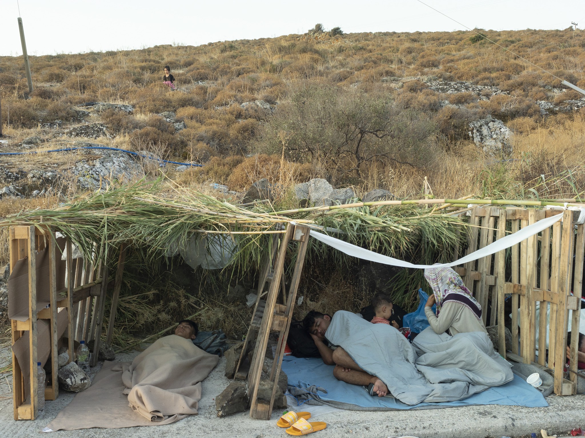 One month after fires destroyed Moria refugee camp, Europe continues to ...